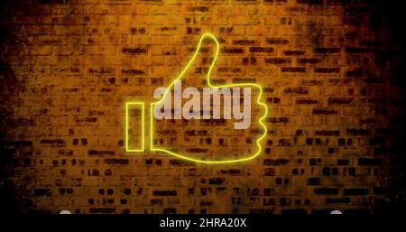 Image of glowing neon thumb up icon on brick wall Stock Photo - Alamy