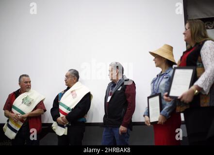 John Elliot, (left), a respected elder of the Tsartlip First Nation and ...