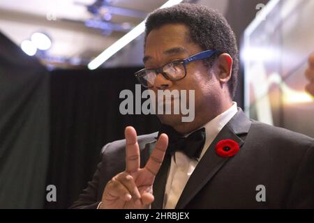 Andre Alexis stands on stage after winning the Giller Prize for his ...