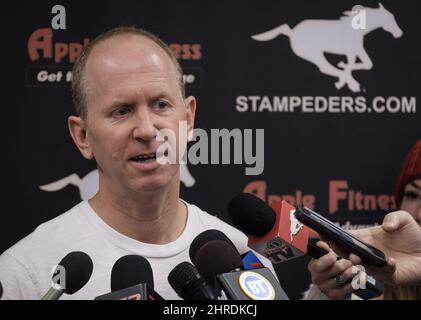 Calgary Stampeders head coach Dave Dickenson gets the water bucket ...