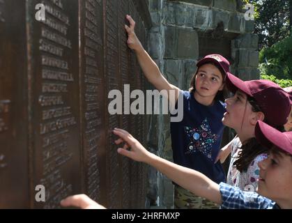 From left, Zoe Spenceley, Alice Goldberger, and Sasha Cellino visit the ...