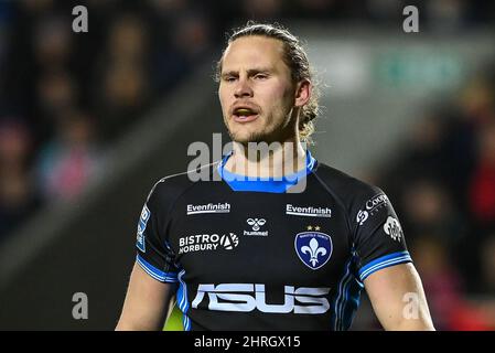 Jacob Miller #6 of Wakefield Trinity is is tackled by Blake Austin of ...