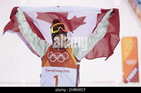 Canadian Mikael Kingsbury celebrates winning his gold medal at the ...