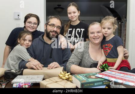 Gabriel Delisle and partner Amelie Auclair wrap Christmas gifts with ...