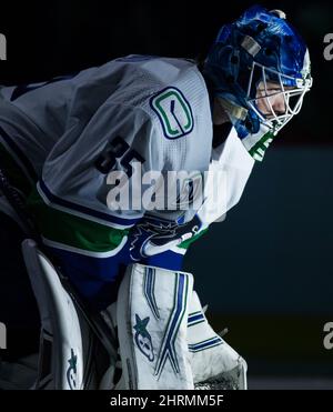Vancouver Canucks goalie Thatcher Demko raises his stick after the team ...
