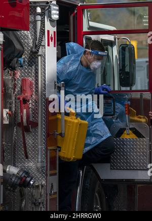 A member of the North Vancouver Fire Department arrives at a call ...