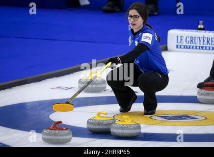 Italy skip Stefania Constantini directs her teammates against Canada at ...