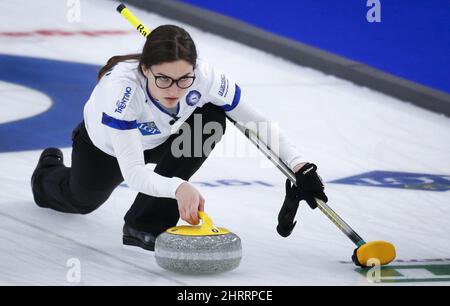 Italy skip Stefania Constantini makes a shot against Team Canada at the ...