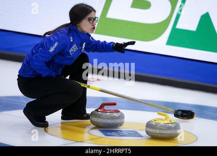 Italy skip Stefania Constantini directs her teammates against Canada at ...