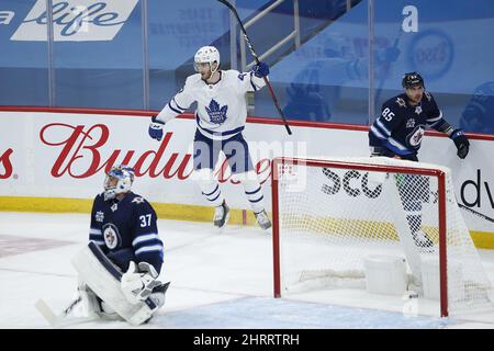 Toronto Maple Leafs' Pierre Engvall celebrates with Colin Blackwell ...