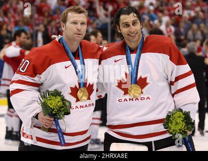 Canada goalies Martin Brodeur, 30, and Roberto Luongo celebrate after ...