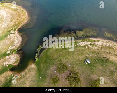 Eungella Dam Queensland Australia with low water levels showing texture ...