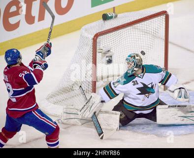 Montreal Canadiens' Mathieu Darche, left, is upended by New York ...