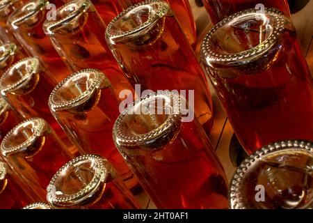 Sparkling dry rose wine production by traditional method in underground ...