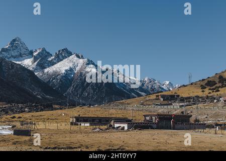 Beautiful view of a valley and tibean snow mountain in the background ...