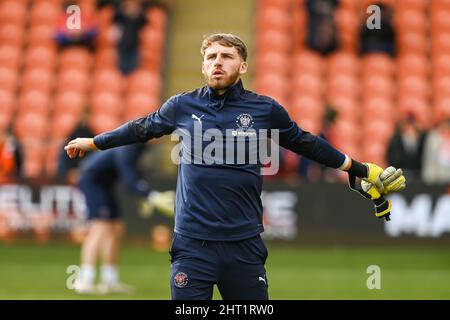 Daniel Grimshaw #32 of Blackpool stretches during the pre-game warmup ...