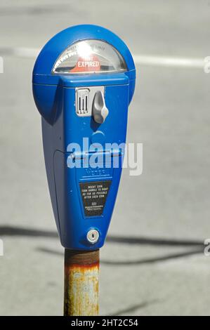Parking meter which take coins for the fee use of the space on public ...