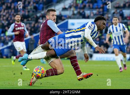 John McGinn of Aston Villa challenges Dwight McNeil of Burnley during ...