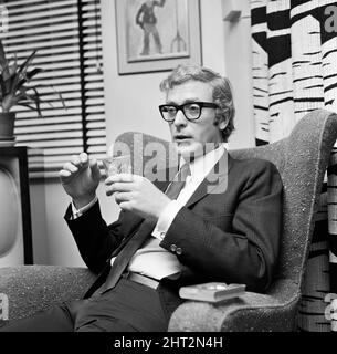 Actor Michael Caine pictured with French actress Miss Elizabeth Ercy in ...