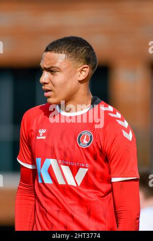 Miles Leaburn of Charlton Athletic on the ball holds off Levi Colwill ...