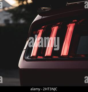 Closeup shot of three red illuminated lines on a car backlight Stock ...