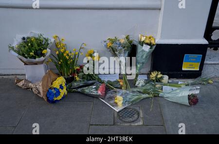 Flowers and messages against the Russian invasion of Ukraine left ...