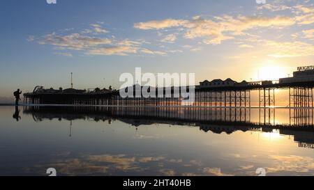 Beautiful shot of the Brighton West Pier at sunset in Brighton, UK ...