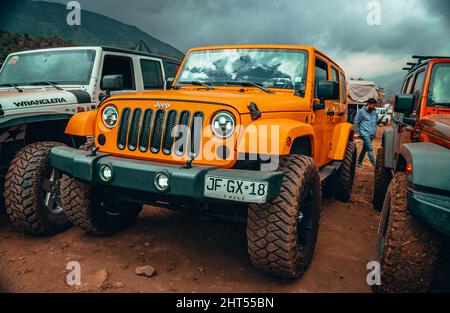 Offroad vehicle passing obstacles on the ground on an offroad course ...