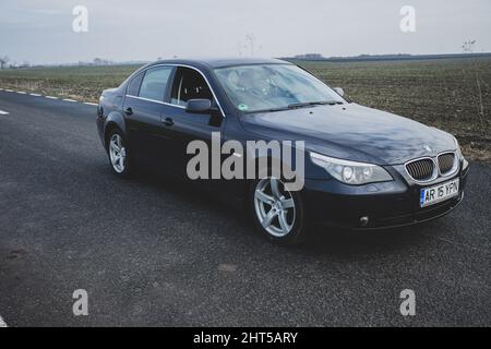BMW Dark Blue Sport e60 car on the road Stock Photo - Alamy