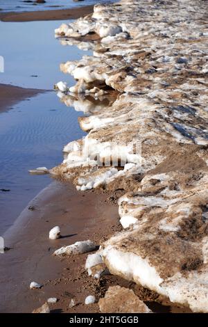 Vertical photo of salt rock formation on a sea shore Stock Photo - Alamy