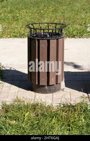 Dustbin in Park at dry sunny summer day Stock Photo - Alamy