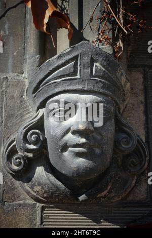 Majestic medieval stone face of a young man with a strong Gothic ...