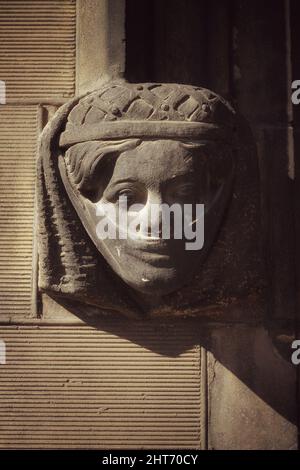 Majestic medieval stone face of a young man with a strong Gothic ...