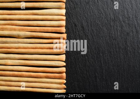 Thin breadsticks called Grissini Torinesi. Shallow depth of field Stock ...