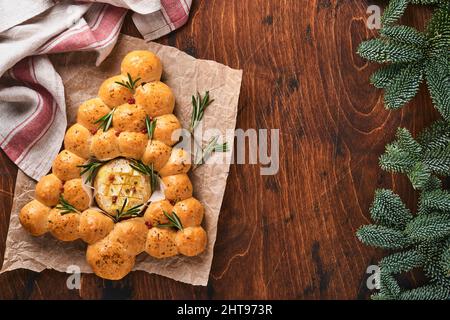 Bread buns Christmas tree with Roasted camembert cheese and rosemary on ...
