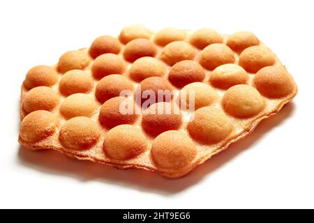 Appetizing traditional bubble wafer placed on white background Stock ...