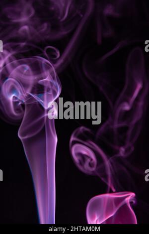 Vertical wallpaper with smoke on black background Stock Photo - Alamy