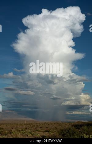 Towering cumulus thunderstorm clouds over the city Stock Photo - Alamy