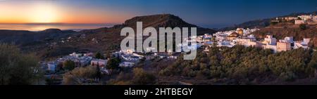 A view of the idyllic whitewashed Andalusian mountain village of ...