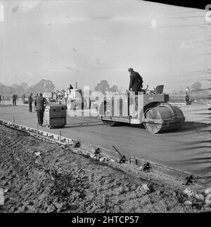 RAF Gaydon, Gaydon, Stratford-on-Avon, Warwickshire, 21/01/1953. A man ...