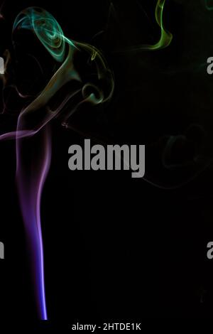 abstract background colorful smoke isolated on black Stock Photo - Alamy