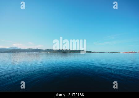 a calm morning water in subic bay Stock Photo - Alamy