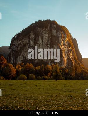 Photo of a high rock stands by the Rio Simpson in the Rio Simpson ...