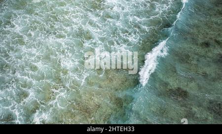 Aerial view of the huge waves crossing the clear tranquil surface of the water Stock Photo - Alamy