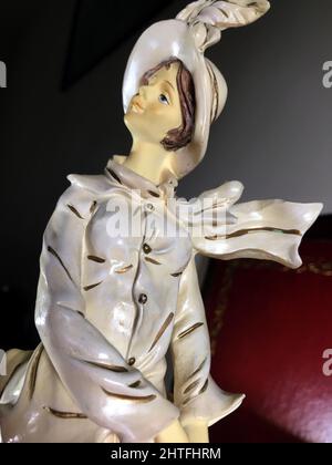 A closeup shot of a vintage Porcelain girl figurine Stock Photo - Alamy