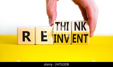 Reinvent and rethink symbol. Businessman turns cubes and changes the ...