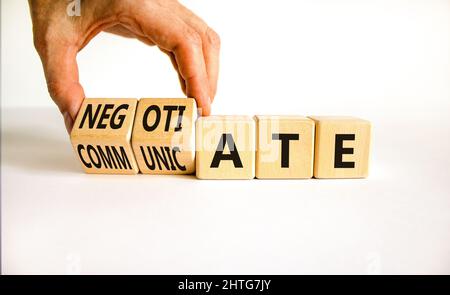 Negotiate and communicate symbol. Businessman turns cubes and changes ...