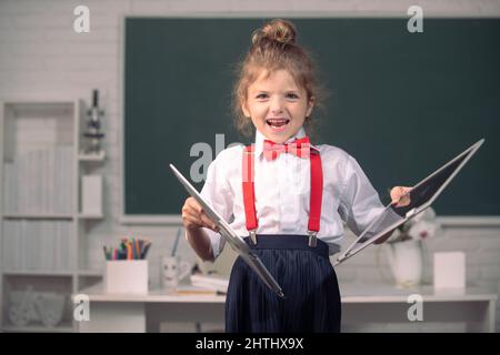 Bad angry school girl vs distance education. Sad kid broken online ...