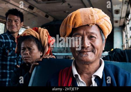 Old local man from the tribe of the Palaung smoking a pipe, portrait ...