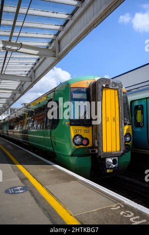 Southern train waiting at Three Bridges railway station, England Stock ...
